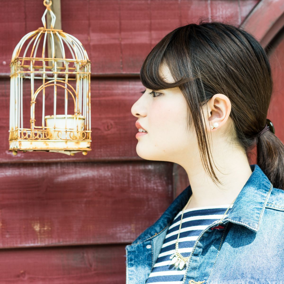 bird in a cage. | GANREF