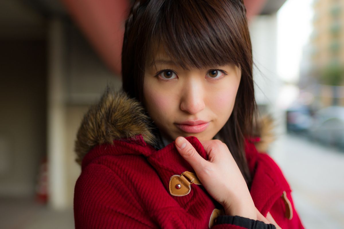 A woman in red | GANREF