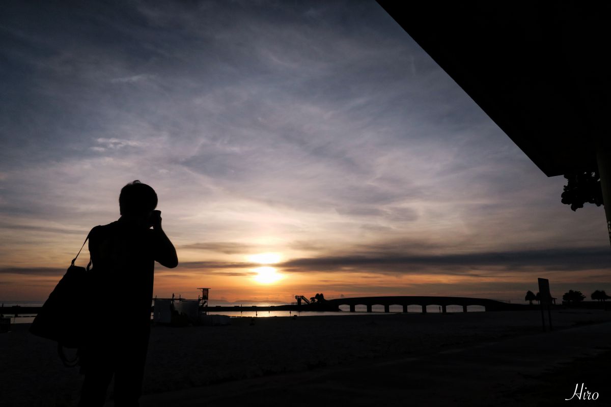 a photographer towards the sunset | GANREF