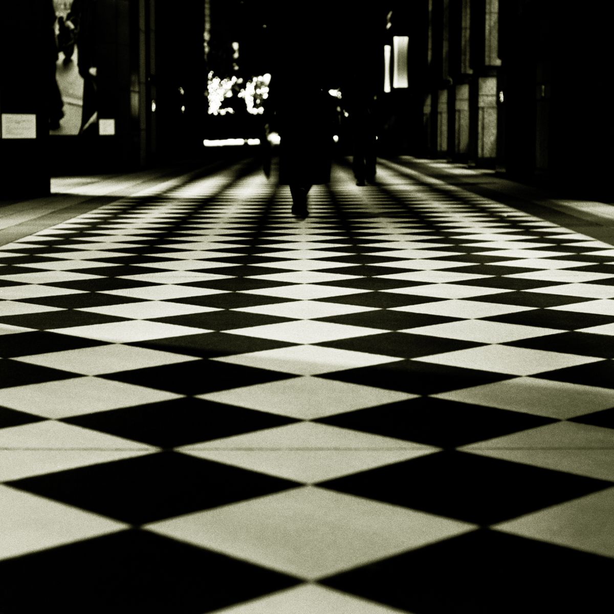 woman walking in a checkerboard pattern | GANREF