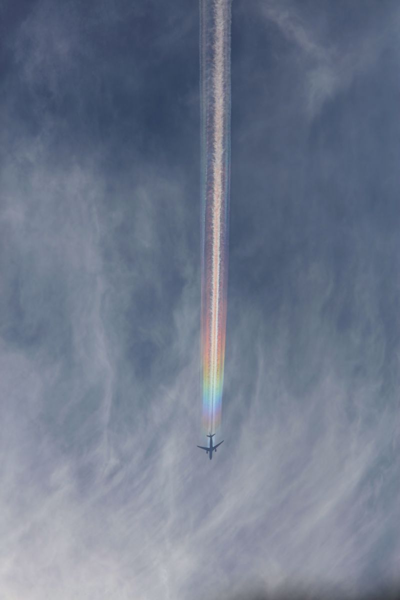 Rainbow-colored contrail of | GANREF