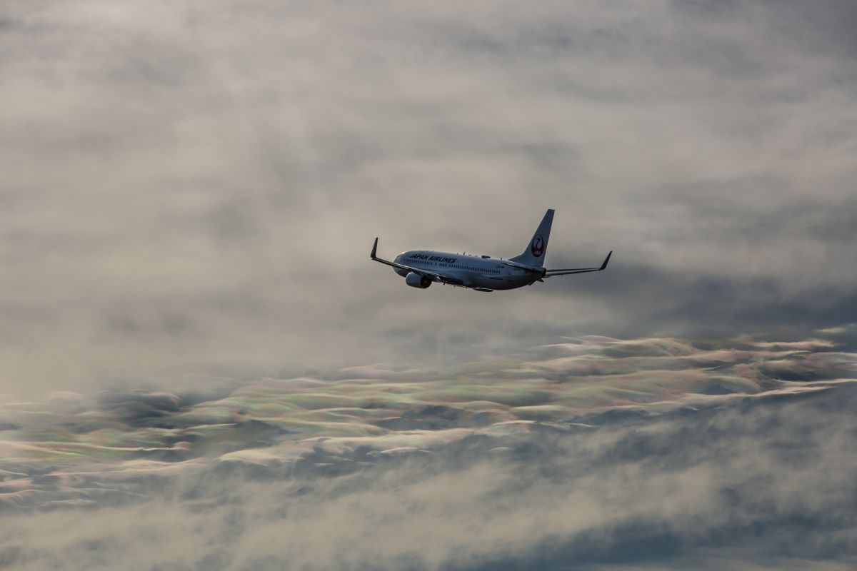 over the iridescent clouds | GANREF