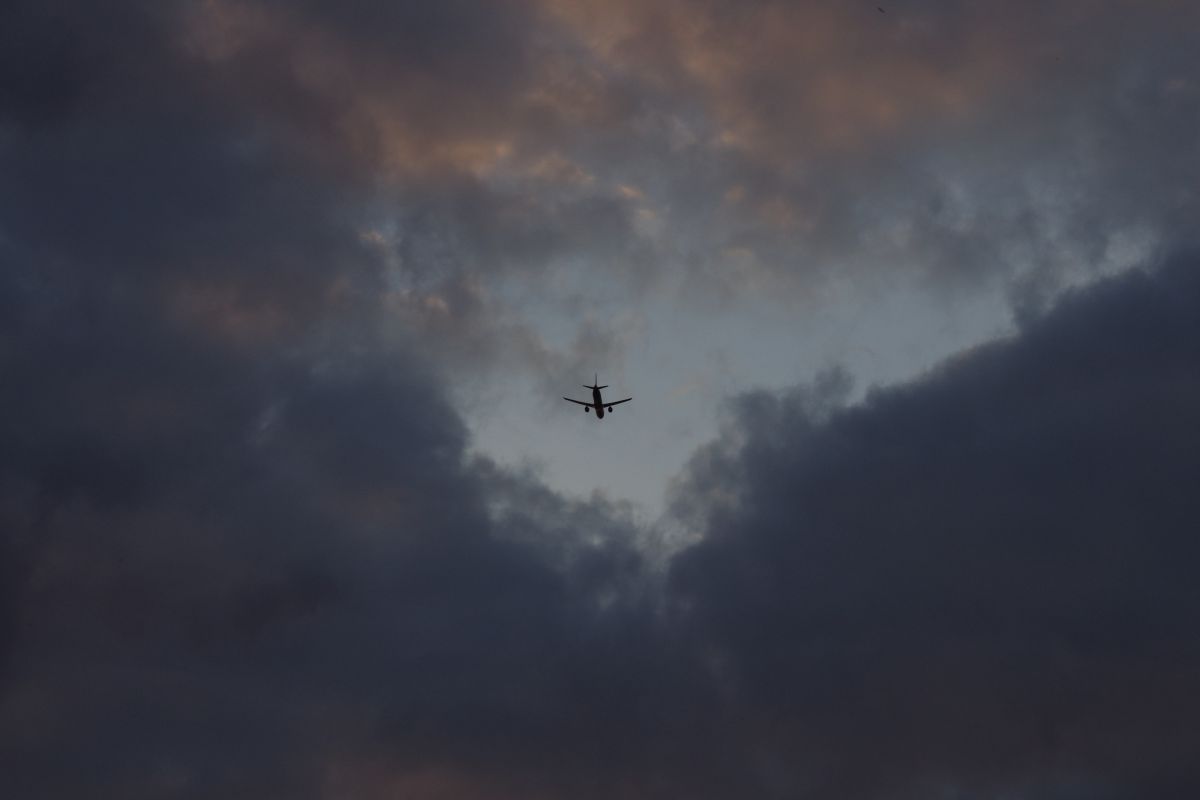 Clouds and an airplane | GANREF