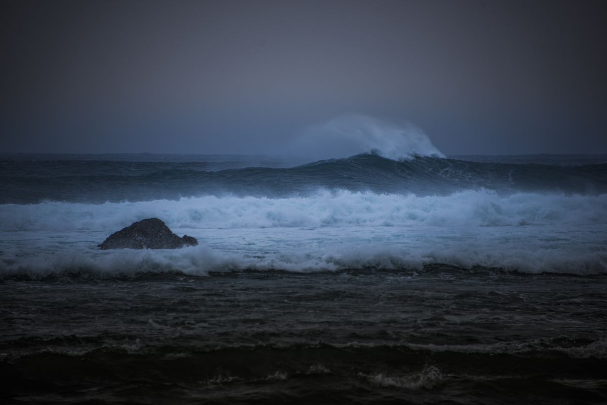 the crest of a wave. | GANREF