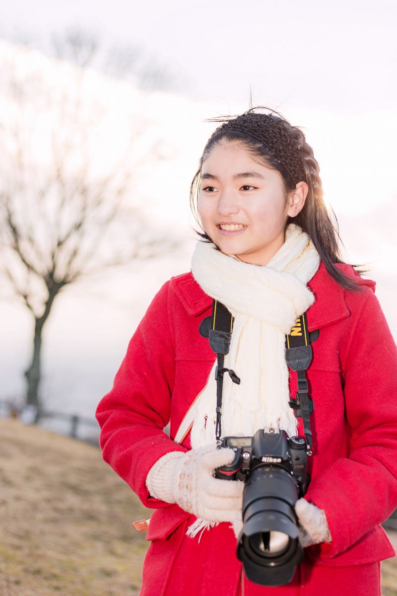photographer in red | GANREF